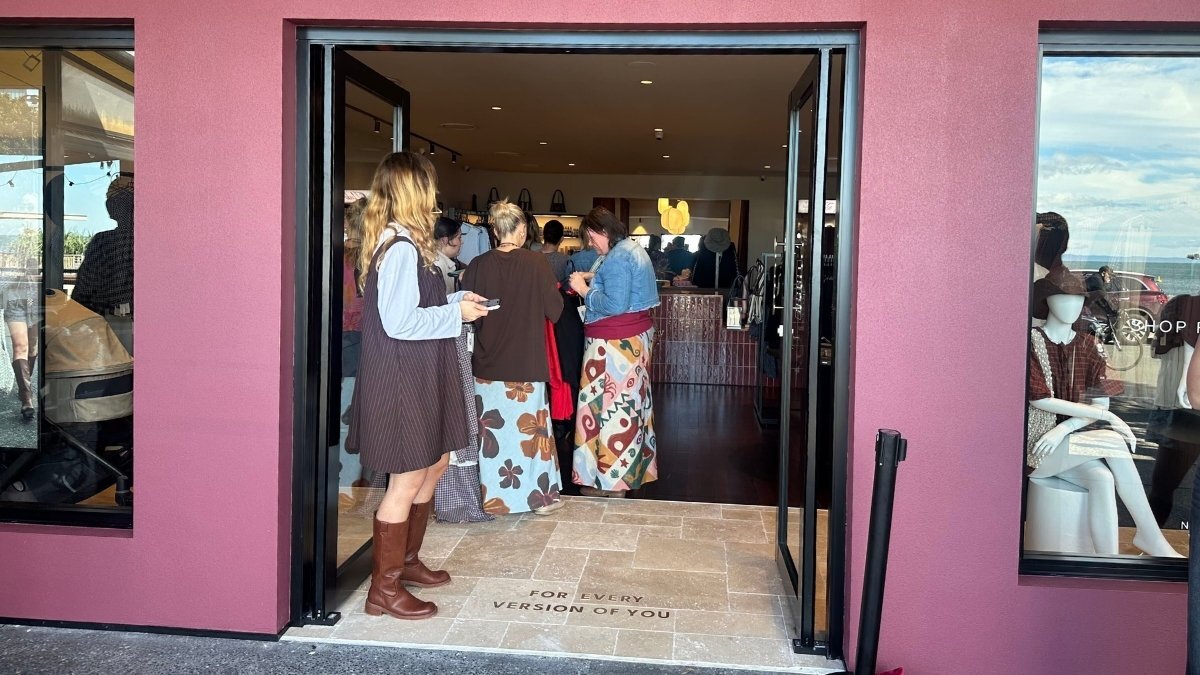 Crowds line-up for new store opening