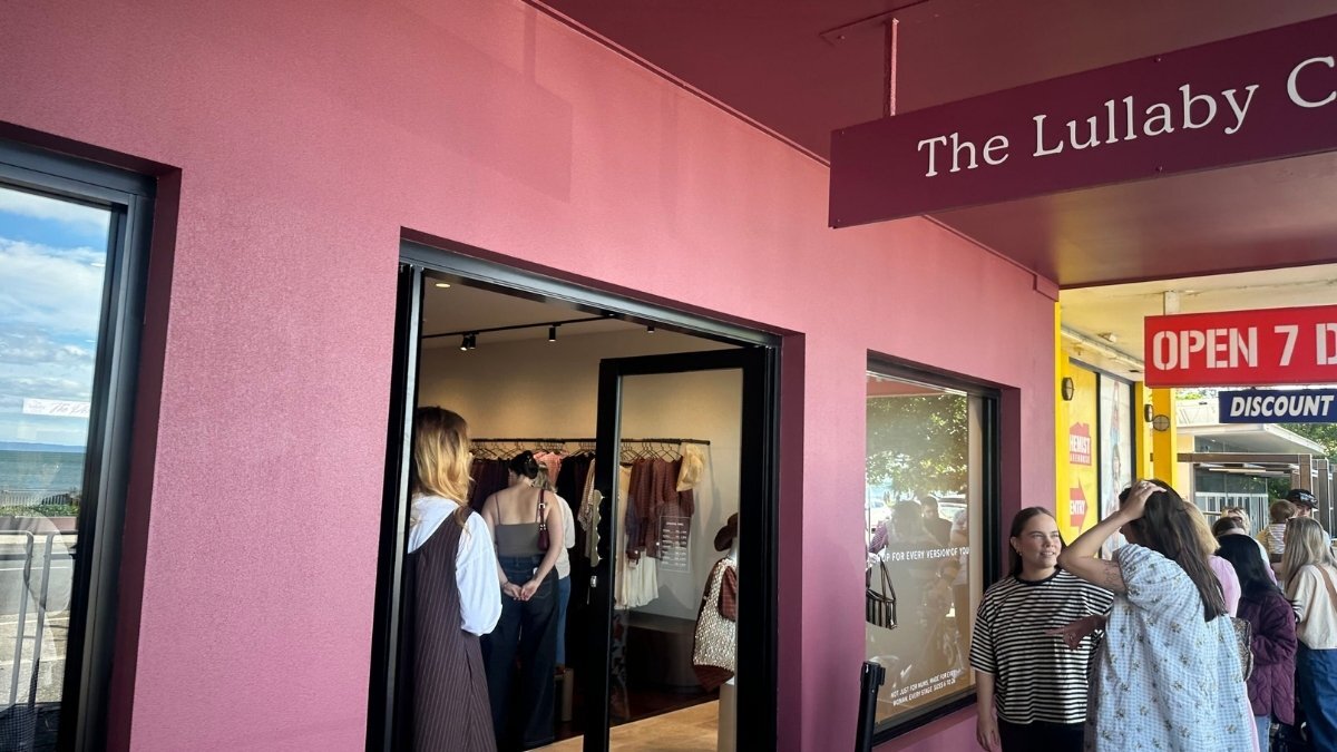 Crowds line-up for new store opening