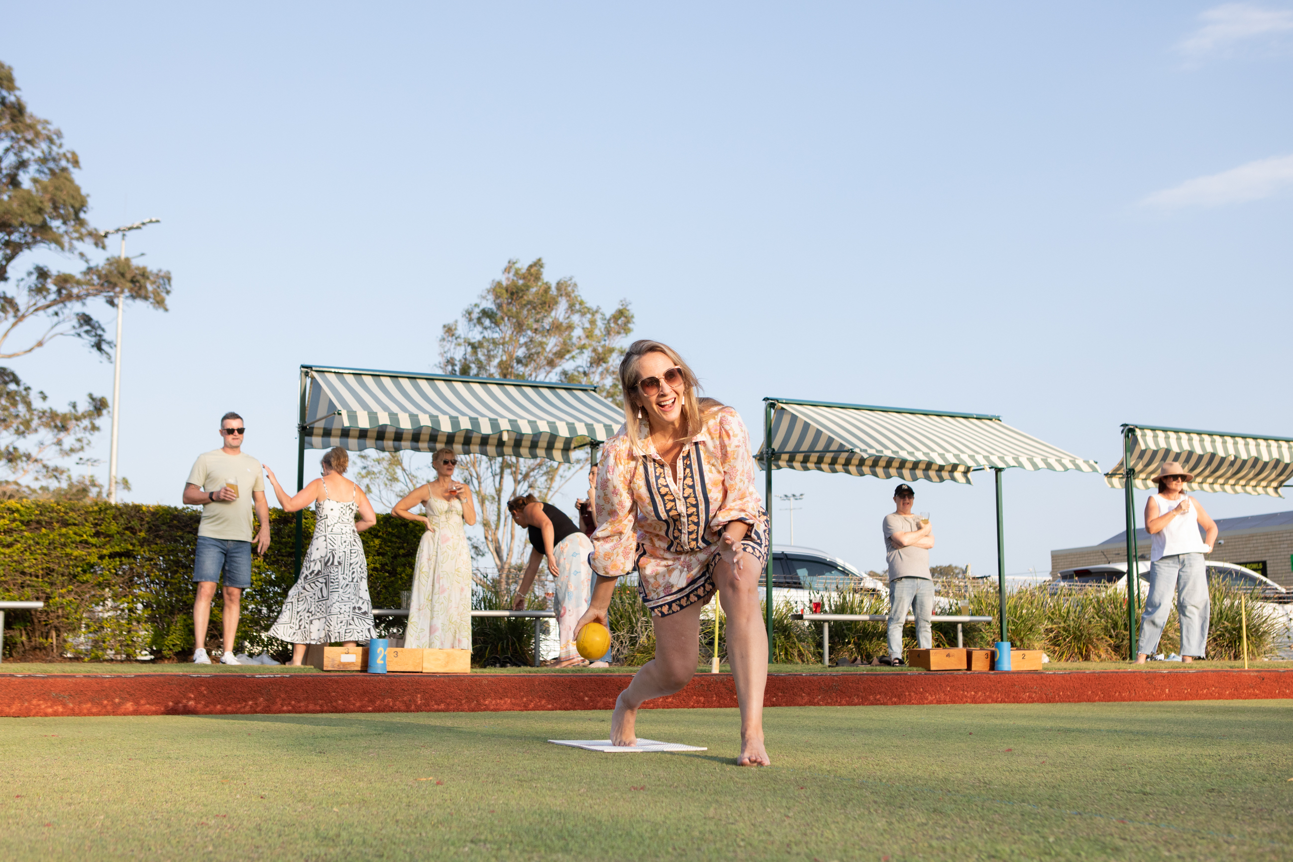 Barefoot bowls, summer fun at Bramble Bay Bowls Club